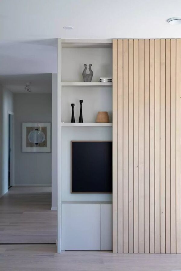 15 ideas de armarios camuflados en el salón